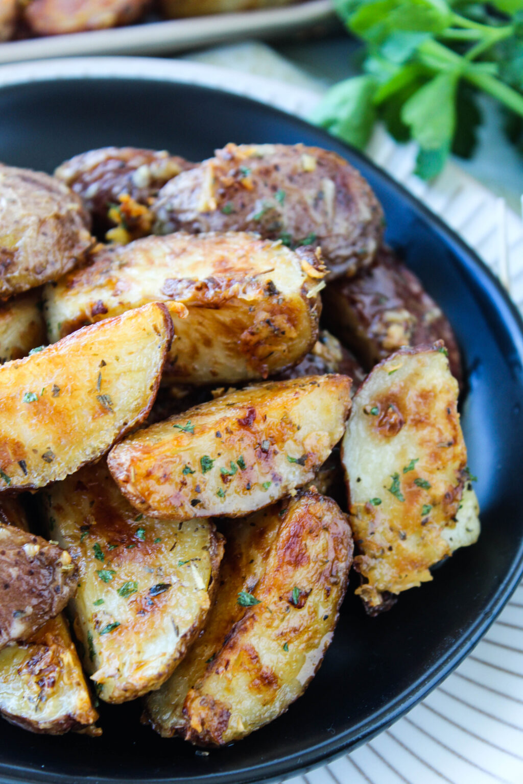 Roasted Garlic Butter Parmesan Potatoes | Baking You Happier