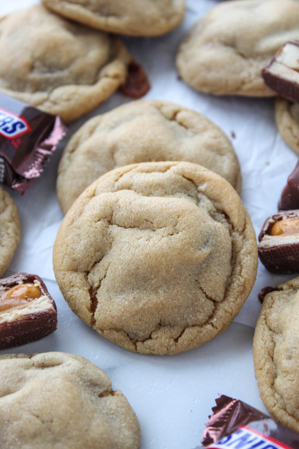 Snicker Surprise Peanut Butter Cookies - Baking You Happier